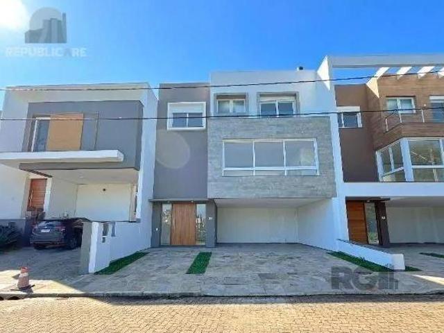 Casa Condominio em Porto Alegre, no bairro Hípica, com 3 dormitório s, e 3 banh