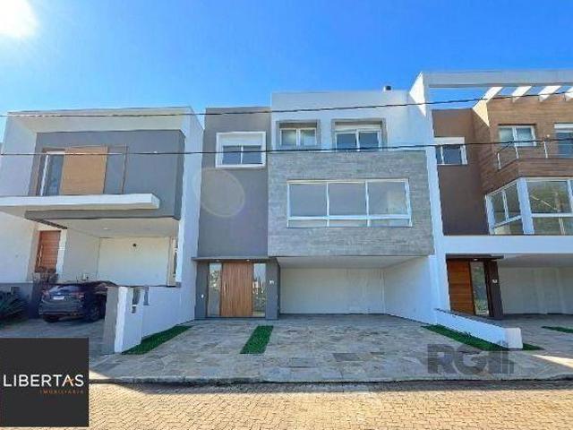 Casa Condominio em Porto Alegre, no bairro Hípica, com 3 dormitório s, e 3 banh