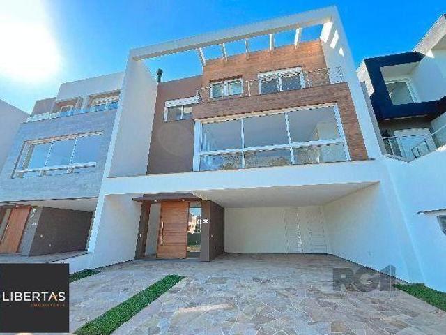 Casa Condominio em Porto Alegre, no bairro Hípica, com 3 dormitório s, e 3 banh