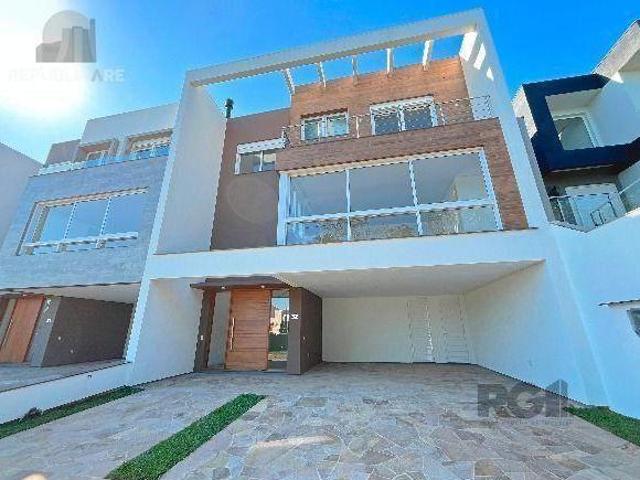 Casa Condominio em Porto Alegre, no bairro Hípica, com 3 dormitório s, e 3 banh
