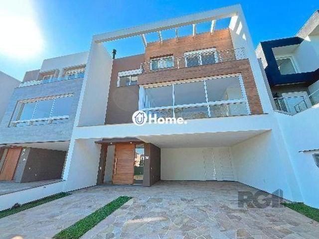 Casa Condominio em Porto Alegre, no bairro Hípica, com 3 dormitório s, e 3 banh
