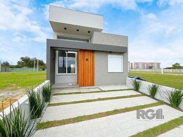 Casa Condominio em Porto Alegre, no bairro Hípica, com 3 dormitório s, e 3 banheiros, à venda