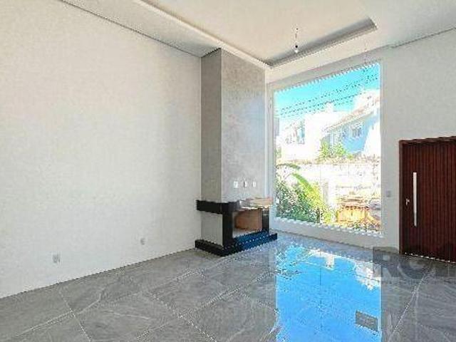 Casa Condominio em Porto Alegre, no bairro Hípica, com 3 dormitório s, e 3 banheiros, à venda