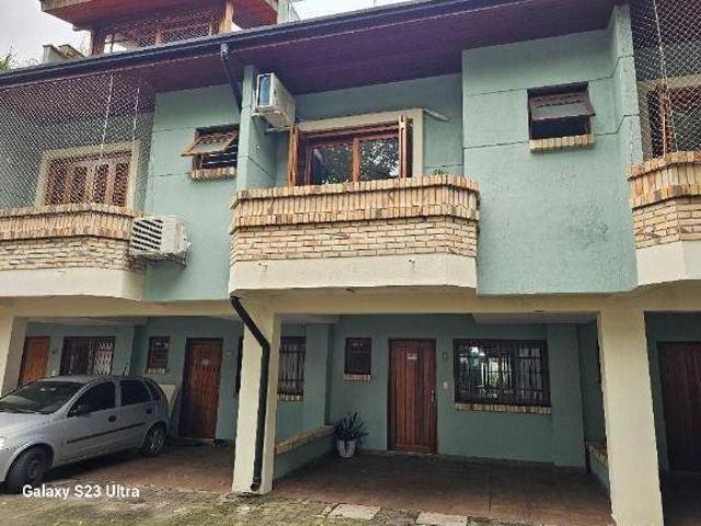 Casa Condominio em Porto Alegre, no bairro Ipanema, com 3 dormitório s, e 3 banheiros, à venda