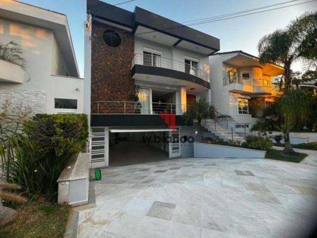 Casa condomínio fechado, com 4 dormitórios, suítes à venda, 636 m² por R$ 6.500.000 Vila Lusitânia