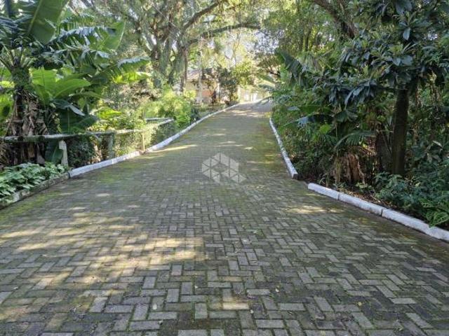CASA CONDOMÍNIO FECHADO COM RESERVA ECOLÓGICA, 4 DORMITÓRIOS, 4 BANHEIROS, 2 VAFAS DE GARAGEM, BAIRR