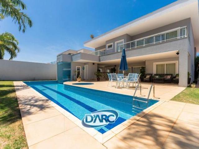 CASA CONDOMINIO JARDINS DO LAGO MODERNA COM PISCINA AQUECIDA, 4 SUITES