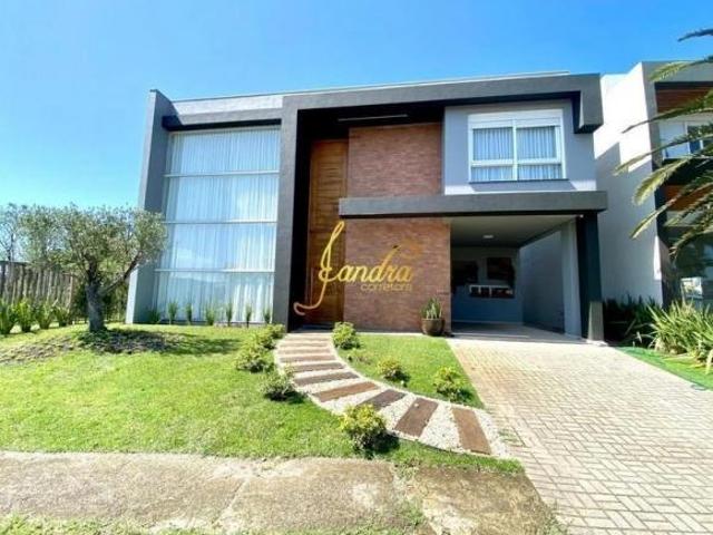 Casa condomínio nova com 04 suítes mobiliado e decorado