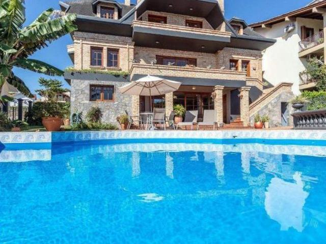 Casa Condominio para Venda 559m², 4 dormitórios, sendo 3 suites, 3 vagas Cavalhada