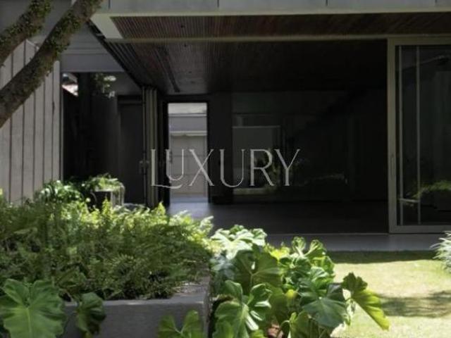 Casa contemporânea com arquitetura autoral no Jardim Europa — 4 suítes, piscina e integração total c
