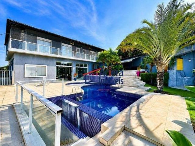 Casa Contemporânea com 4 Dormitórios, Piscina e Academia à venda, 711 m² Pousada dos Bandeirantes