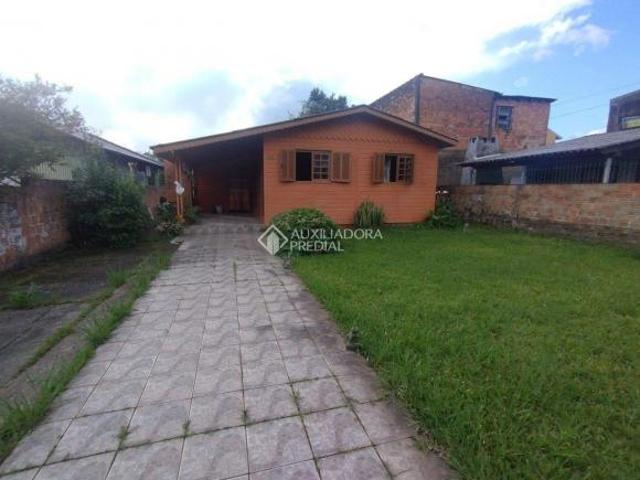 Casa de madeira à venda no bairro Bom Sucesso, em Gravataí