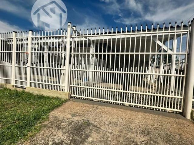 Casa de madeira à venda no bairro Vila Vista Alegre Cachoeirinha/RS