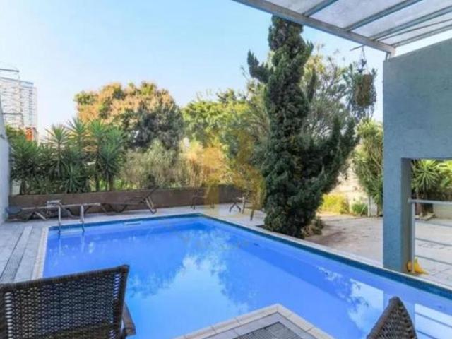 Casa de Alto Padrão no Brooklin com 690m², 4 Dormitórios, Piscina Aquecida e Área Gourmet Completa