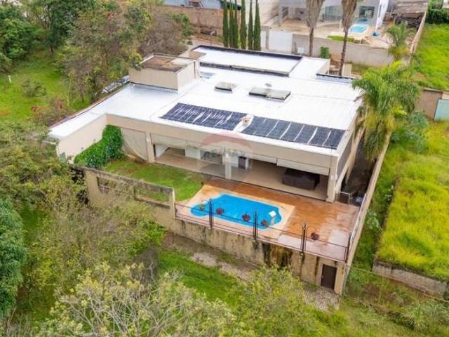 CASA DE ALTO PADRÃO NO JARDIM BOTÂNICO | 4 SUÍTES | 500m² | LAZER COMPLETO + VISTA PRIVILEGIADA