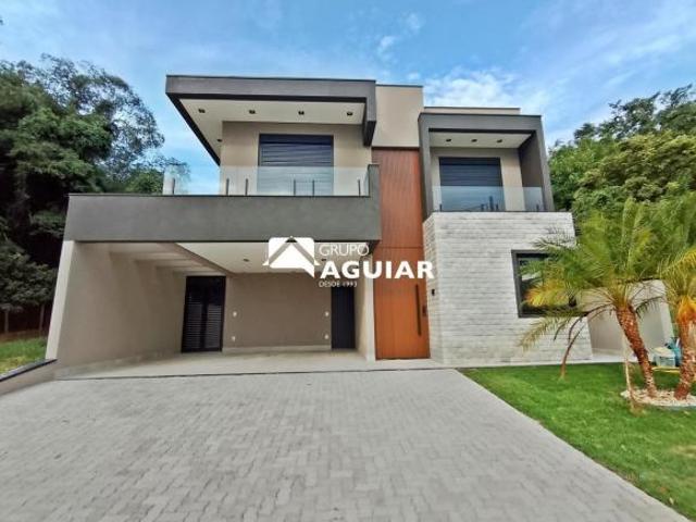 Casa de alto padrão no Reserva dos Jatobás: piscina aquecida, energia solar e 46