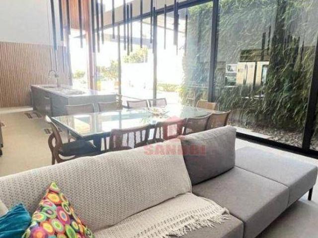 CASA DE ALTO PADRÃO Á VENDA, LOCALIZADA EM UM DOS CONDOMINIOS MAIS VALORIZADOS DE PORTO RICO PR