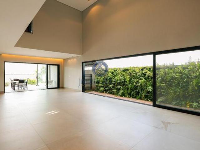 Casa de alto padrão à venda no condomínio Gênesis 02, Alphaville, 4 suítes, 2 vagas e 390m² de área
