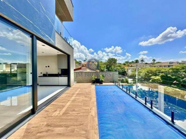 Casa de alto padrão à venda no condomínio São Paulo II, Granja Viana, 4 suítes, 6 vagas e 440m² de á
