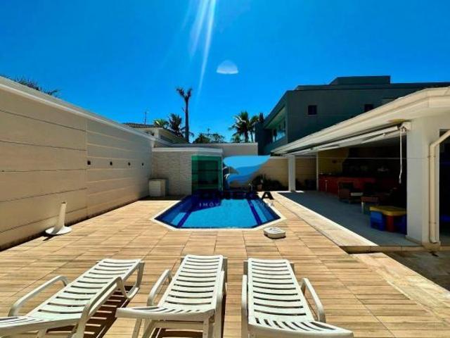 Casa de alto padrão à venda no Jardim Acapulco no Guarujá I Omega Imoveis