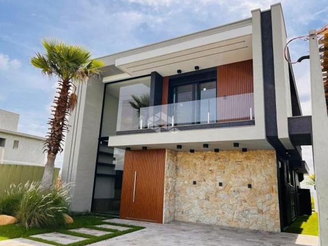 Casa de alto padrão com 4 suítes, piscina e beira lago no Allure Beach Condo Xangri Lá/RS