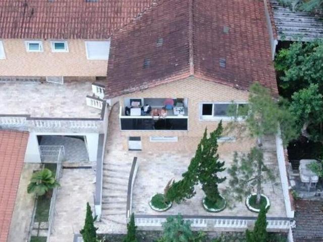 Casa de alto padrão com 3 suítes à venda, 424 m² por R$ 3.000.000 Canto do Forte Praia Grande/SP