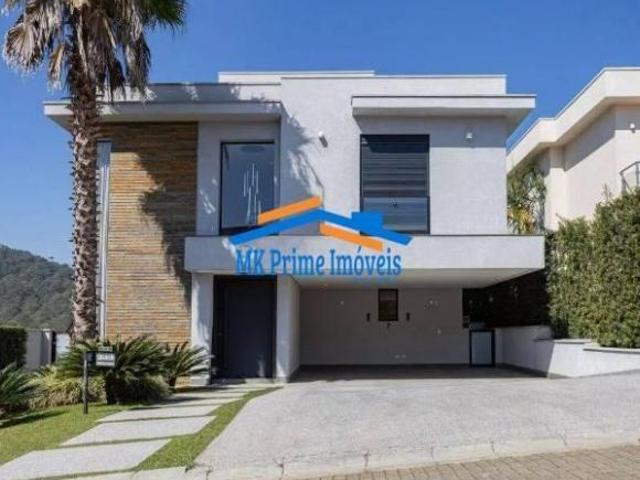 Casa de alto padrão com interiores assinados Tamboré 11