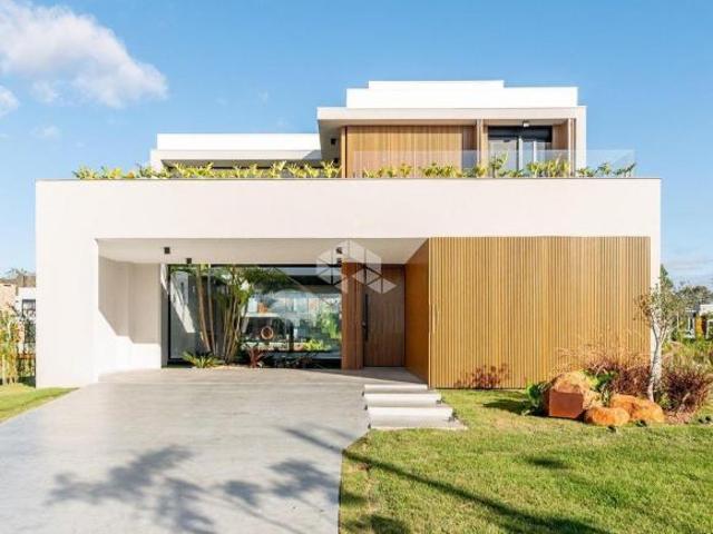 Casa de Alto Padrão em Condomínio | 400m² | 3 Suítes | 4 Vagas | Sans Souci Eldorado do Sul