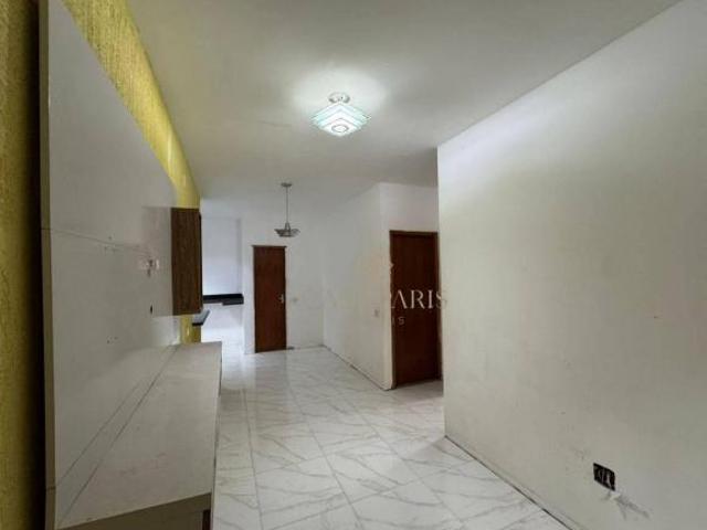 Casa de condomínio com 2 dormitórios à venda, 52 m² por R$ 240.000 Tude Bastos Praia Grande/SP