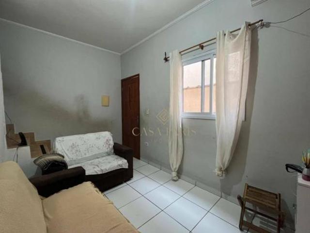Casa de condomínio com 2 dormitórios à venda, 52 m² por R$ 355.000 Tude Bastos Praia Grande/SP