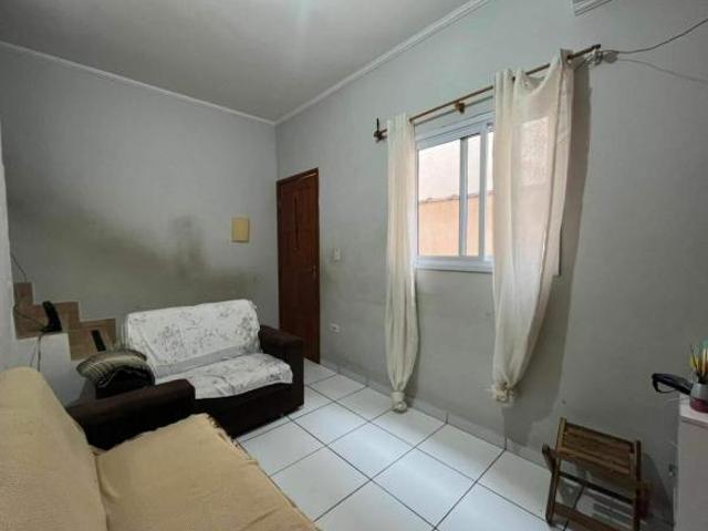 Casa de condomínio com 2 dormitórios à venda, 52 m² por R$ 355.000 Tude Bastos Praia Grande/SP