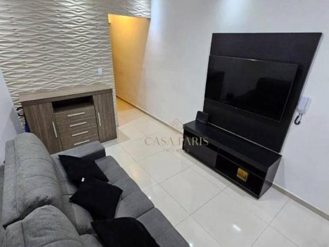 Casa de condomínio com 2 dormitórios à venda, 55 m² por R$ 320.000 Canto do Forte Praia Grande/S