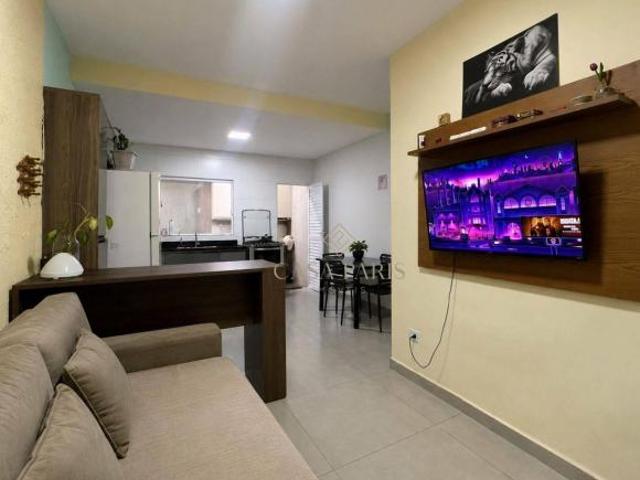 Casa de condomínio com 2 dormitórios à venda, 62 m² por R$ 380.000 Maracanã Praia Grande/SP