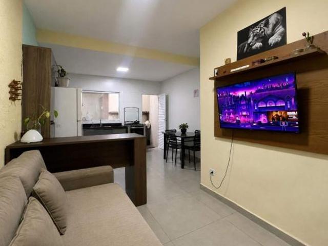 Casa de condomínio com 2 dormitórios à venda, 62 m² por R$ 380.000 Maracanã Praia Grande/SP