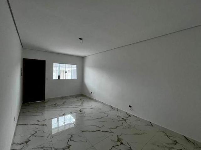 Casa de condomínio com 2 dormitórios à venda, 118 m² por R$ 550.000 Tude Bastos Praia Grande/SP