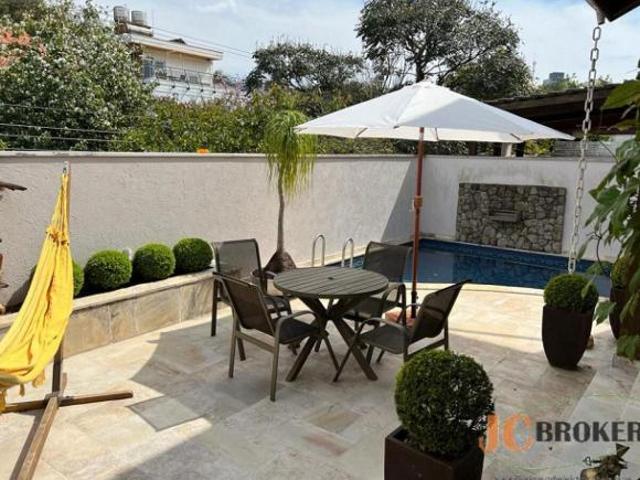Casa de condomínio com 375,58 m², 4 suítes, 6 vagas