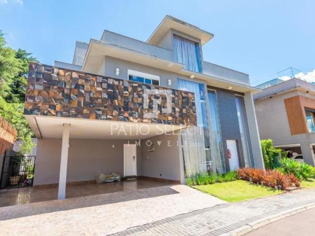 Casa de condomínio com 330 m², 5 quartos sendo 5 suítes à venda no bairro Campo Comprido