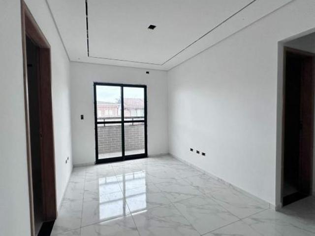 Casa de condomínio com 3 dormitórios à venda, 75 m² por R$ 410.000 Tude Bastos Praia Grande/SP