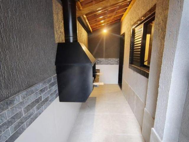 Casa de condomínio com 3 dormitórios à venda, 80 m² por R$ 550.000 Caiçara Praia Grande/SP