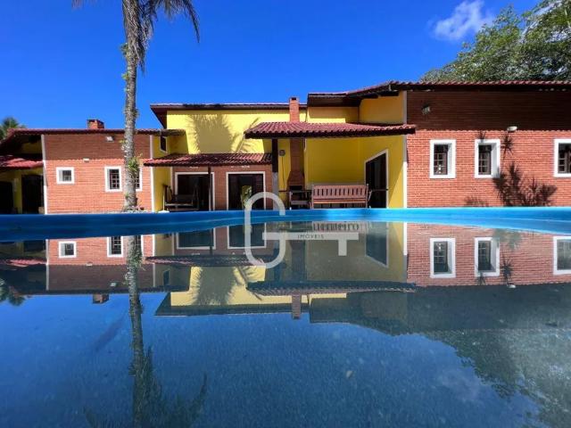 Casa de Condomínio com 3 Quartos e 5 banheiros à Venda, 354 m² por R$ 1.250.000
