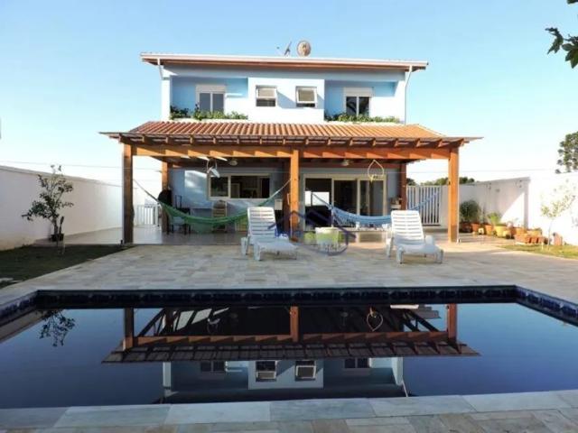 Casa de Condomínio com 3 Quartos e 5 banheiros à Venda, 374 m² por R$ 1.968.000