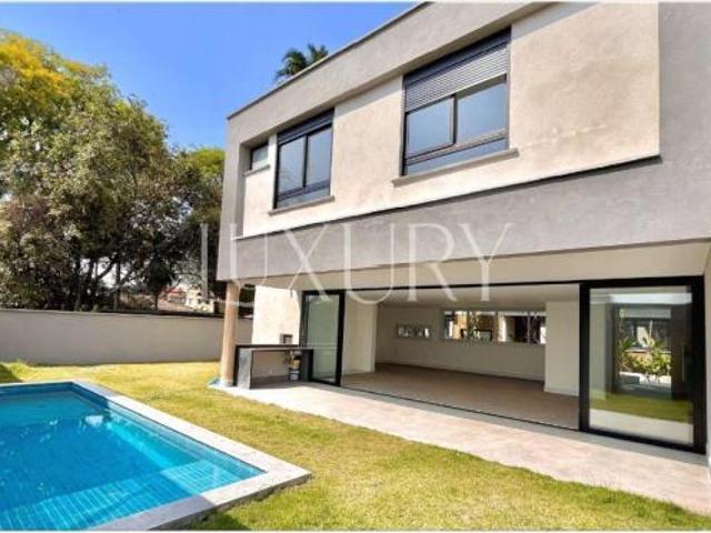 Casa de condomínio com 440.33 m², 4 quartos sendo 4 suítes à venda no bairro Santo Amaro