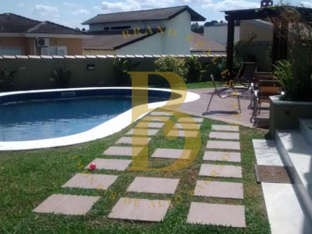 Casa de condomínio com 480 m², 3 quartos sendo 2 suítes à venda no bairro Res. Morada dos Lagos