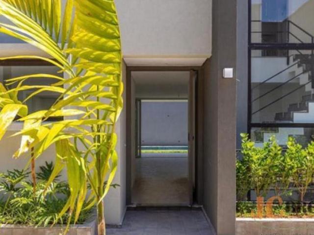 Casa de condomínio com 401,12 m², 4 suítes, 3 vagas de garagem