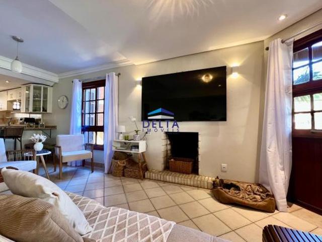 Casa de condominio, com 4 dormitorios, sendo 4 suites a venda em Torres/RS