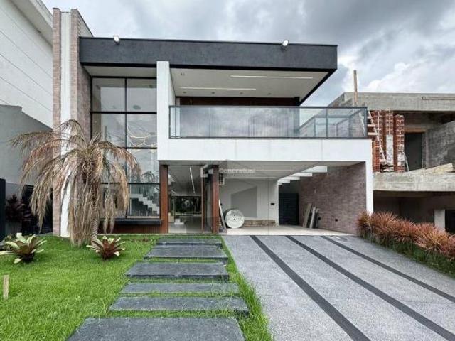 Casa à venda no Aruã EcoPark – Mogi das Cruzes | 4 suítes | Fundo para reserva | Ref. 2012