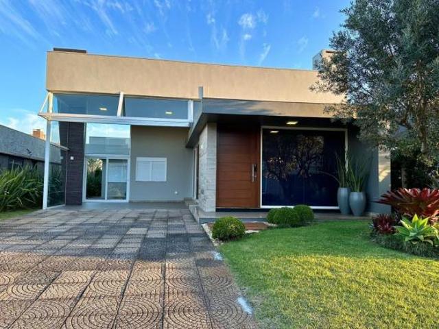Casa de Condomínio com 4 quartos à venda em Xangri Lá, no bairro Centro