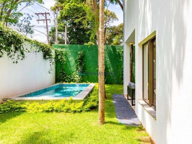 CASA DE CONDOMÍNIO COM 4 QUARTOS À VENDA. 650 m²
