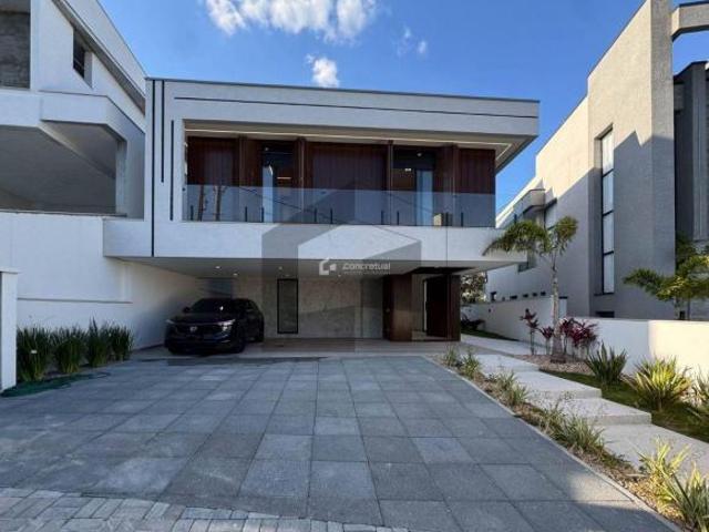 Casa a venda no Condomínio Aruã Brisas Mogi das Cruzes 4 Suítes fundo para reserva