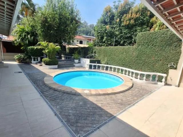 Casa de Condomínio com 4 Quartos e 5 banheiros à Venda, 334 m² por R$ 1.420.000